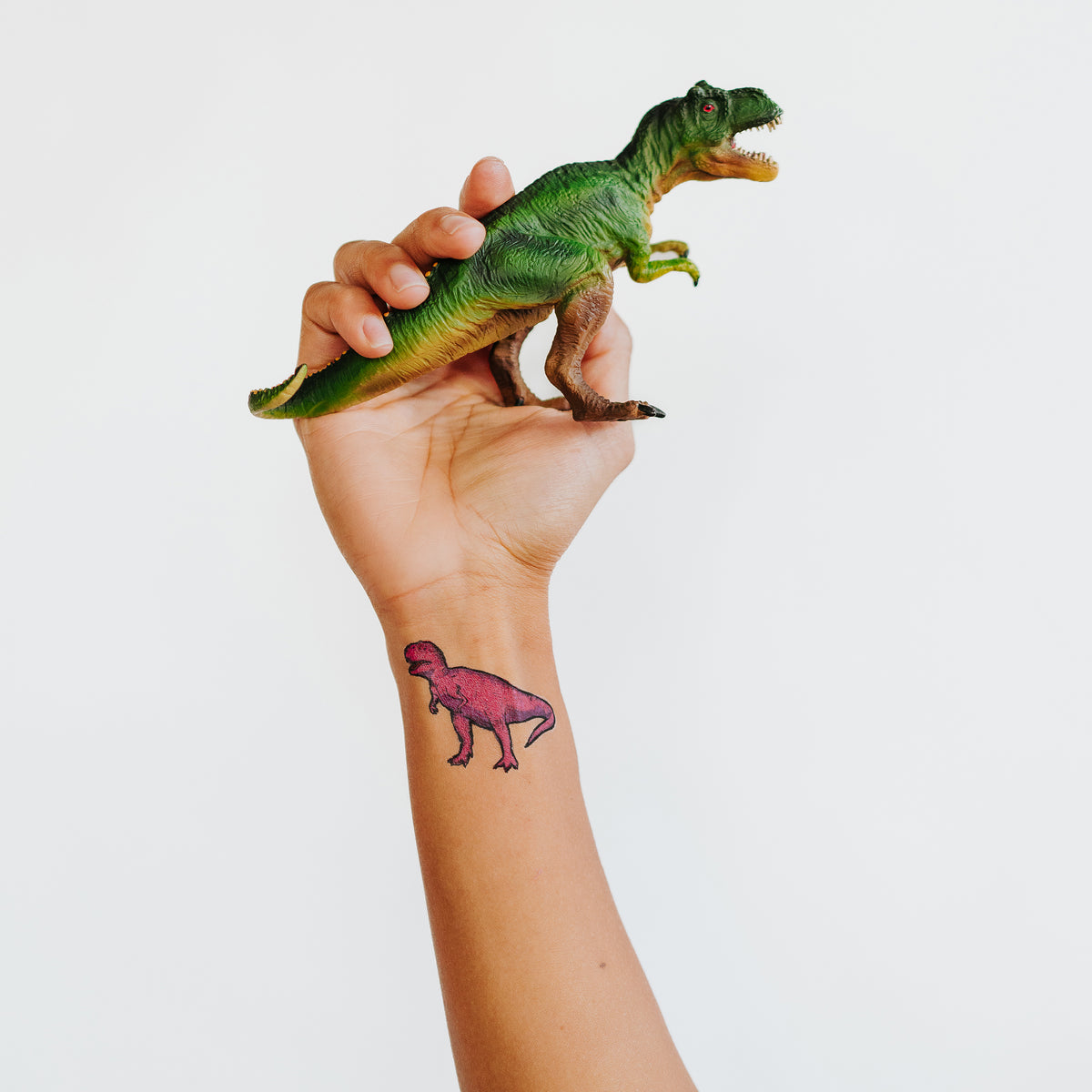Pink T Rex by Peagreen | Tattly Temporary Jurassic Pink Tattoo