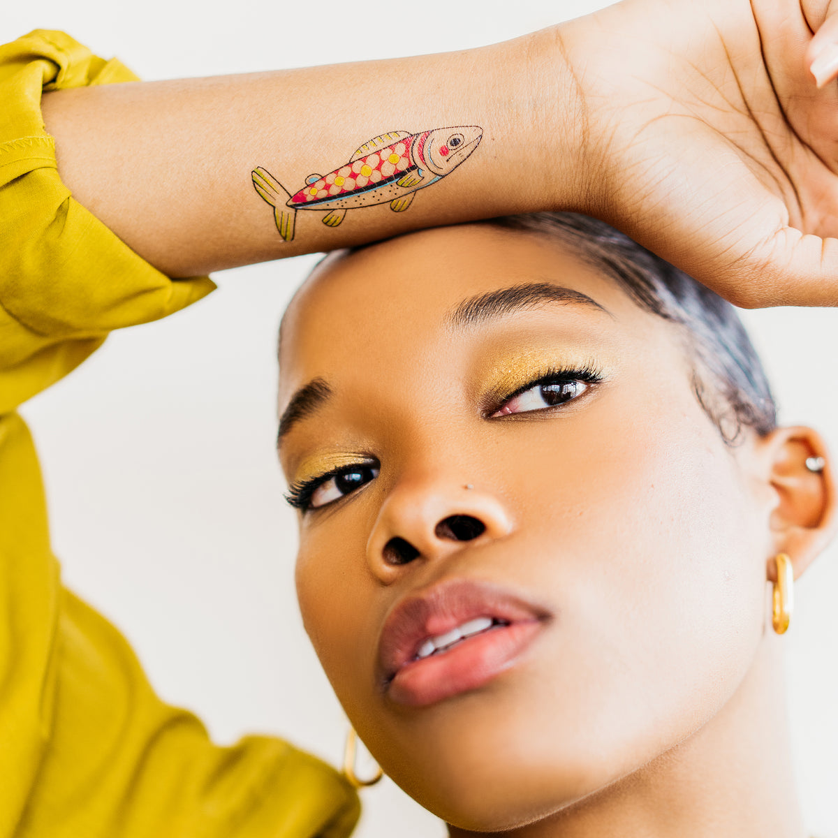 Daisy Fish by Gossamer Rozen from Tattly Temporary Tattoos